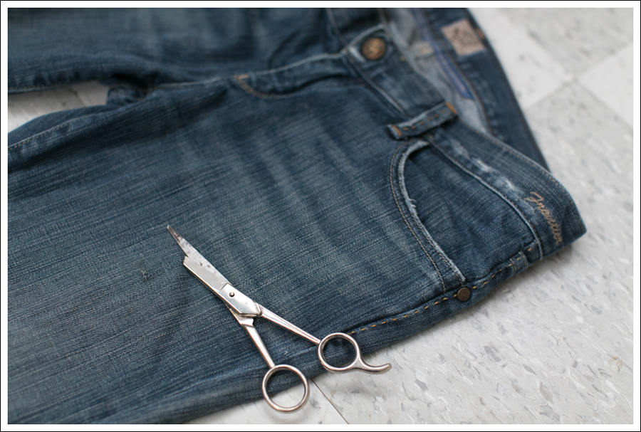 DIY destroyed jeans with the strings attached…